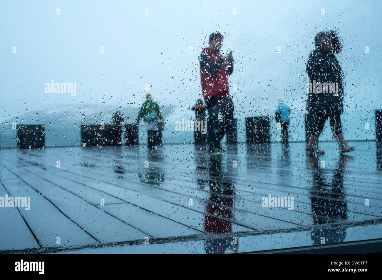 People seen out of focus through rain covered window. Iceland Stock ...