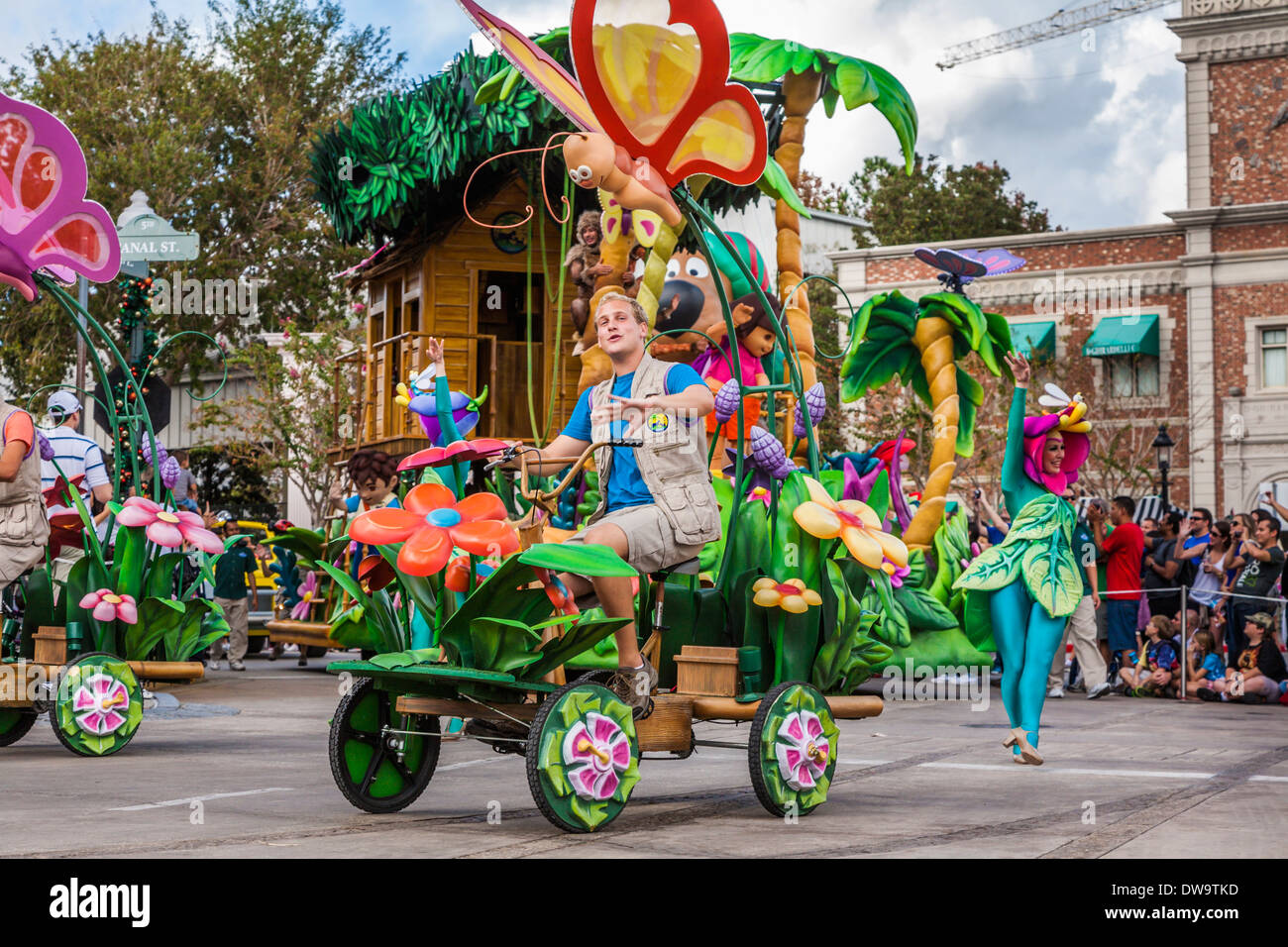 Young man rides decorated parade vehicle in Universal Studios theme ...