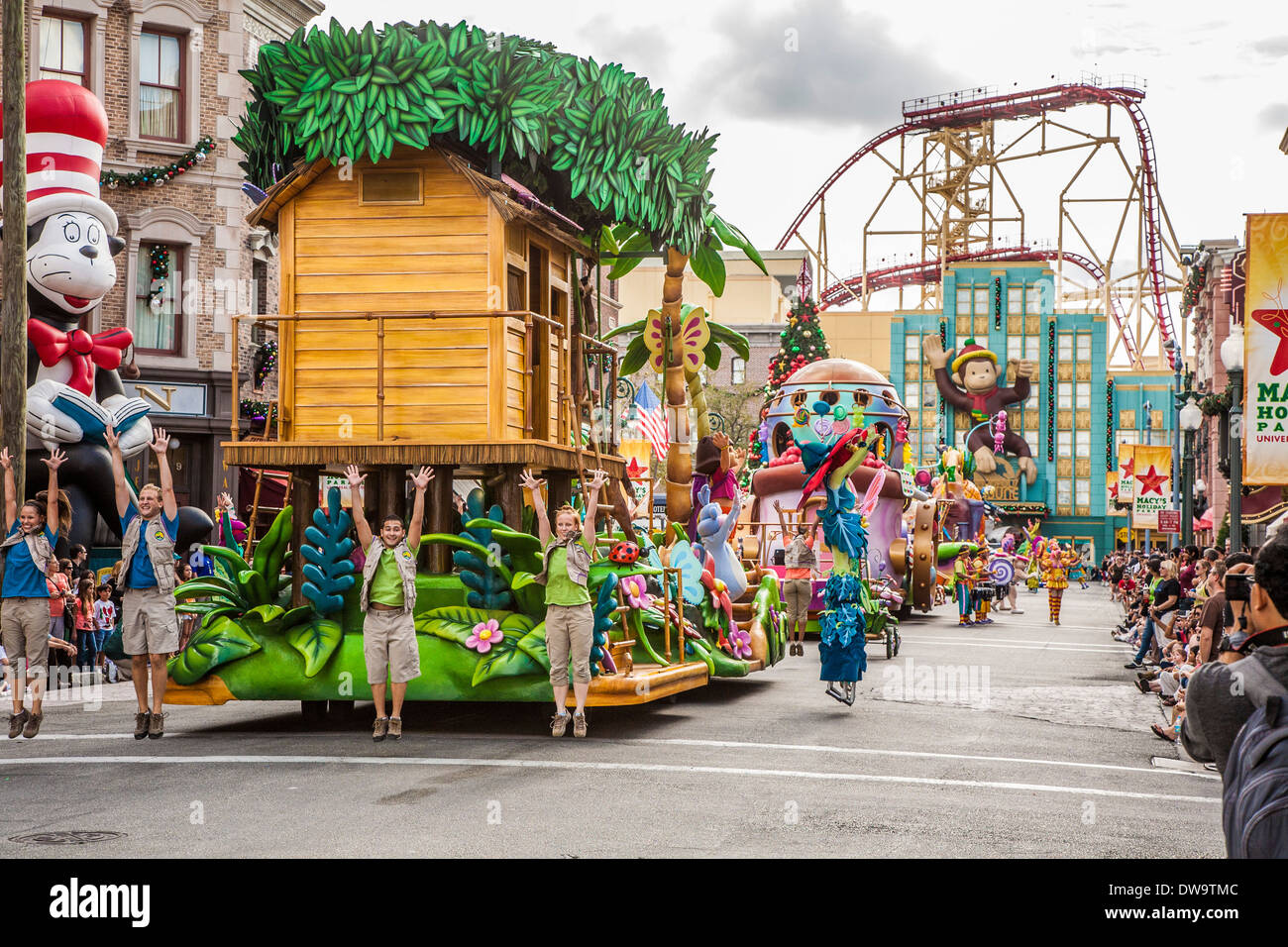 Dancers and acrobats jump to the music playing in parade at Universal ...