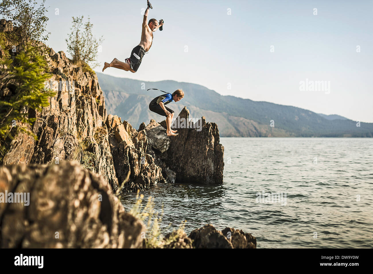 Boy diving rock hi-res stock photography and images - Alamy