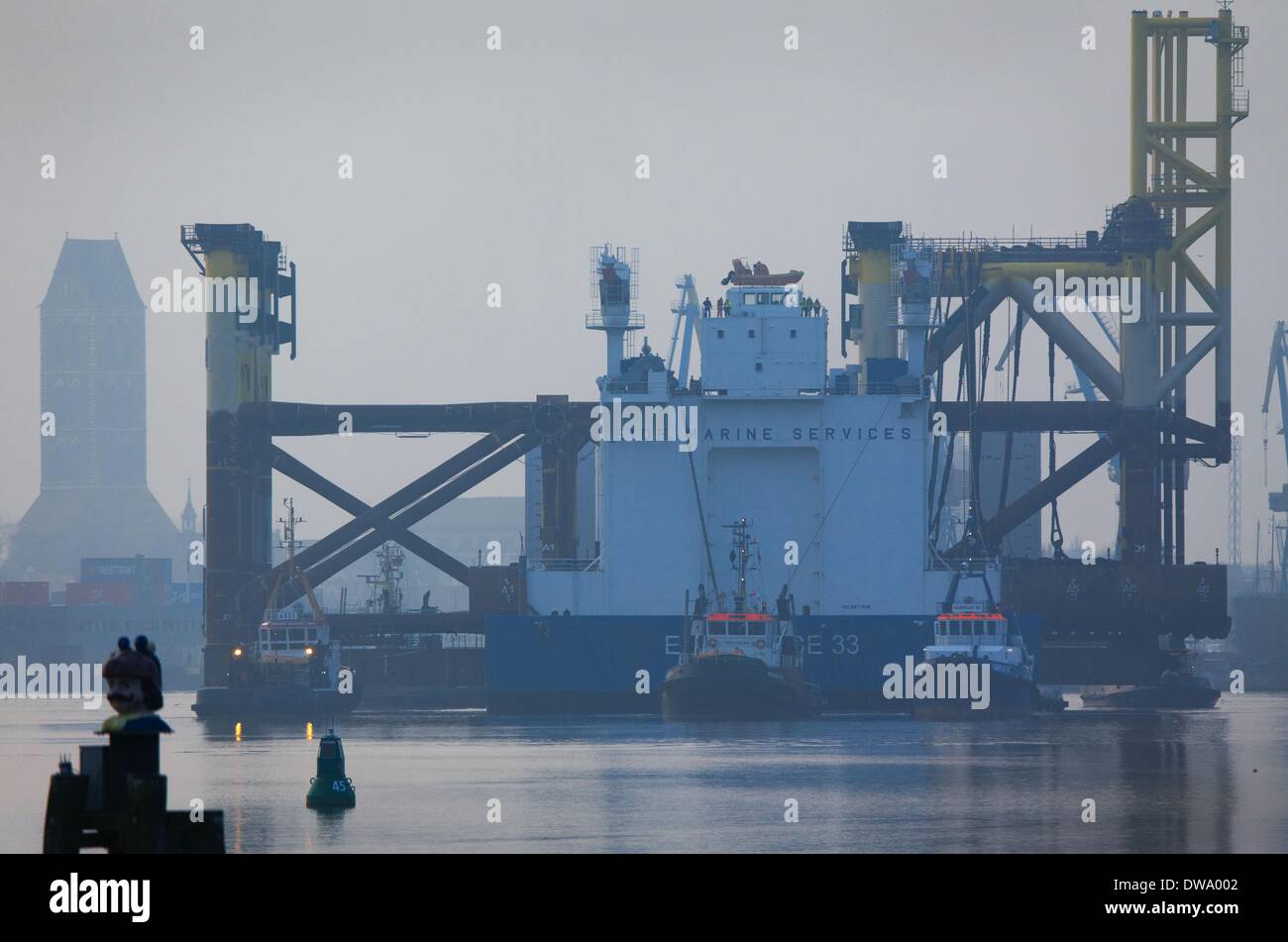Wismar, Germany. 04th Mar, 2014. The foundation weighing 7,000 tons for ...