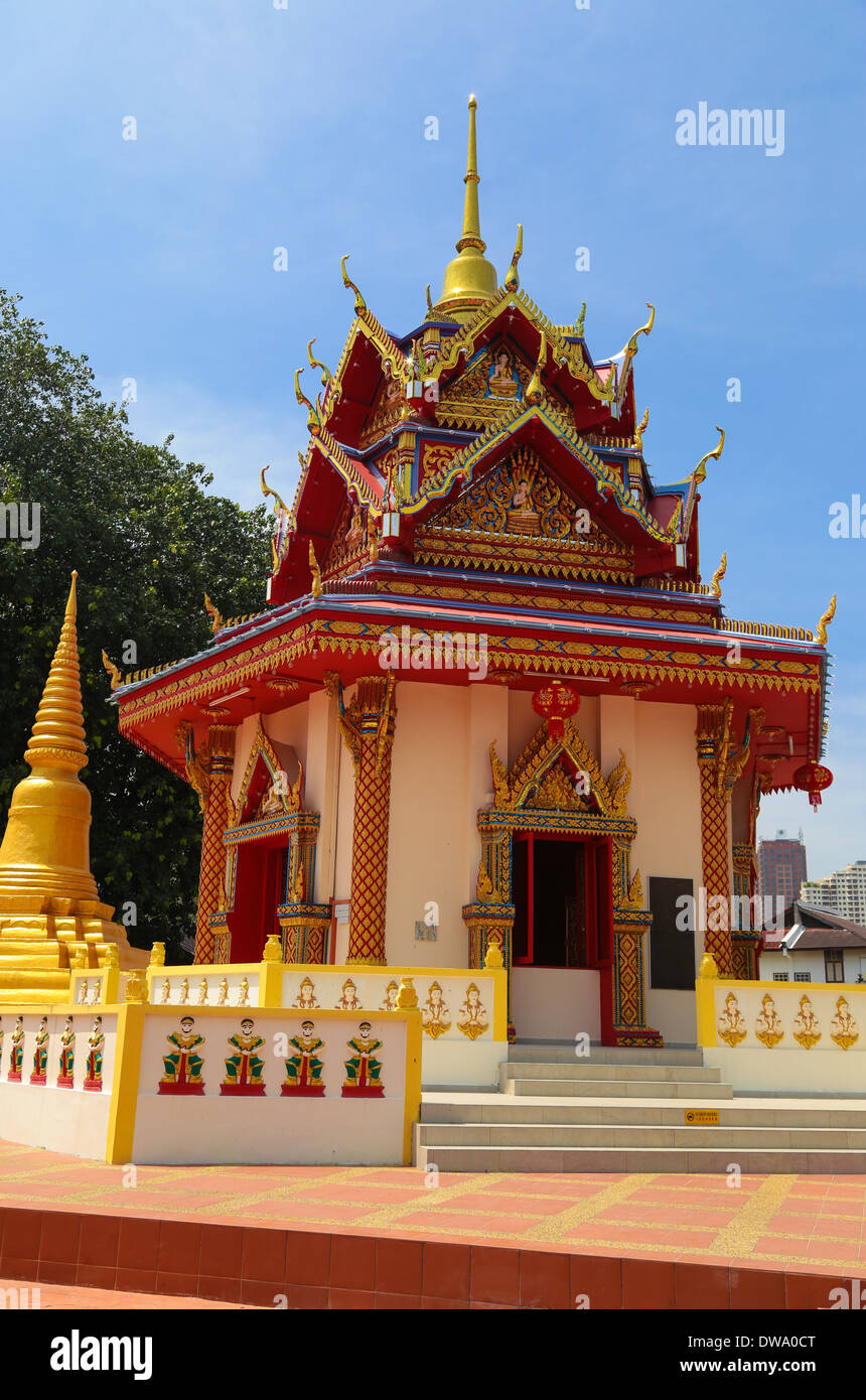 A traditional thai temple structure inside the compound of ...