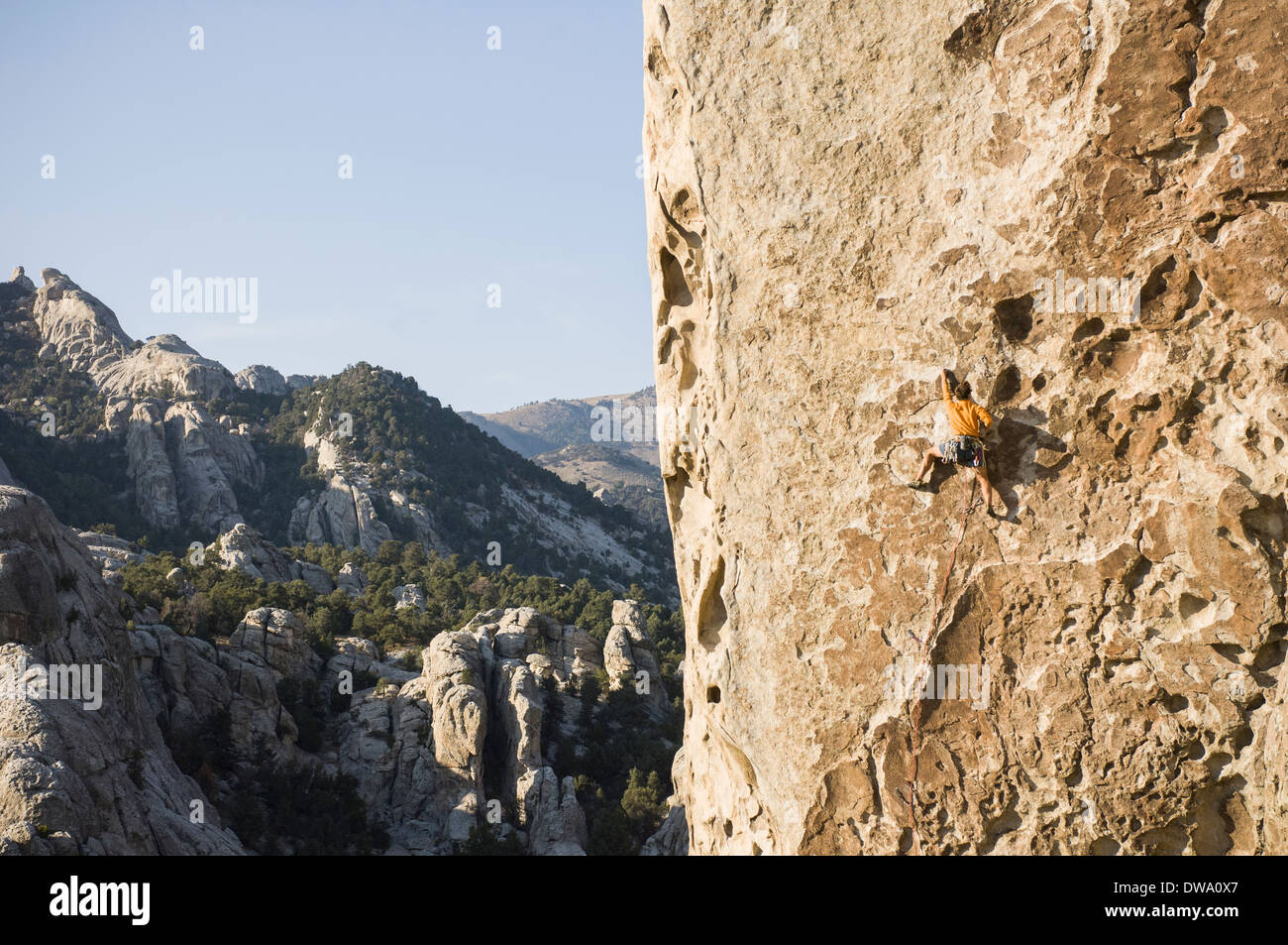 Man climbing "Tribal Boundaries" 5.10a - Flaming Rock, City of Rocks ...