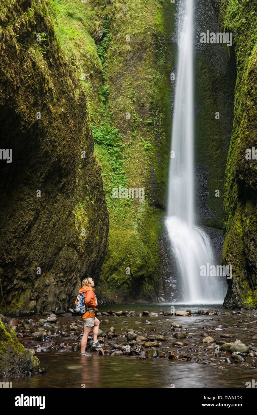 Woman Hiking at the base of Oneonta Falls, Columbia River Gorge, Oregon ...