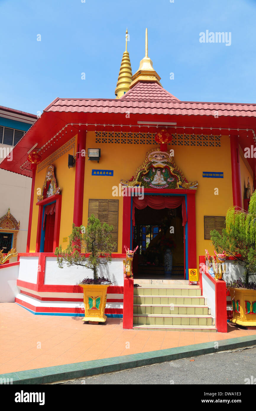 A traditional thai temple structure inside the compound of ...