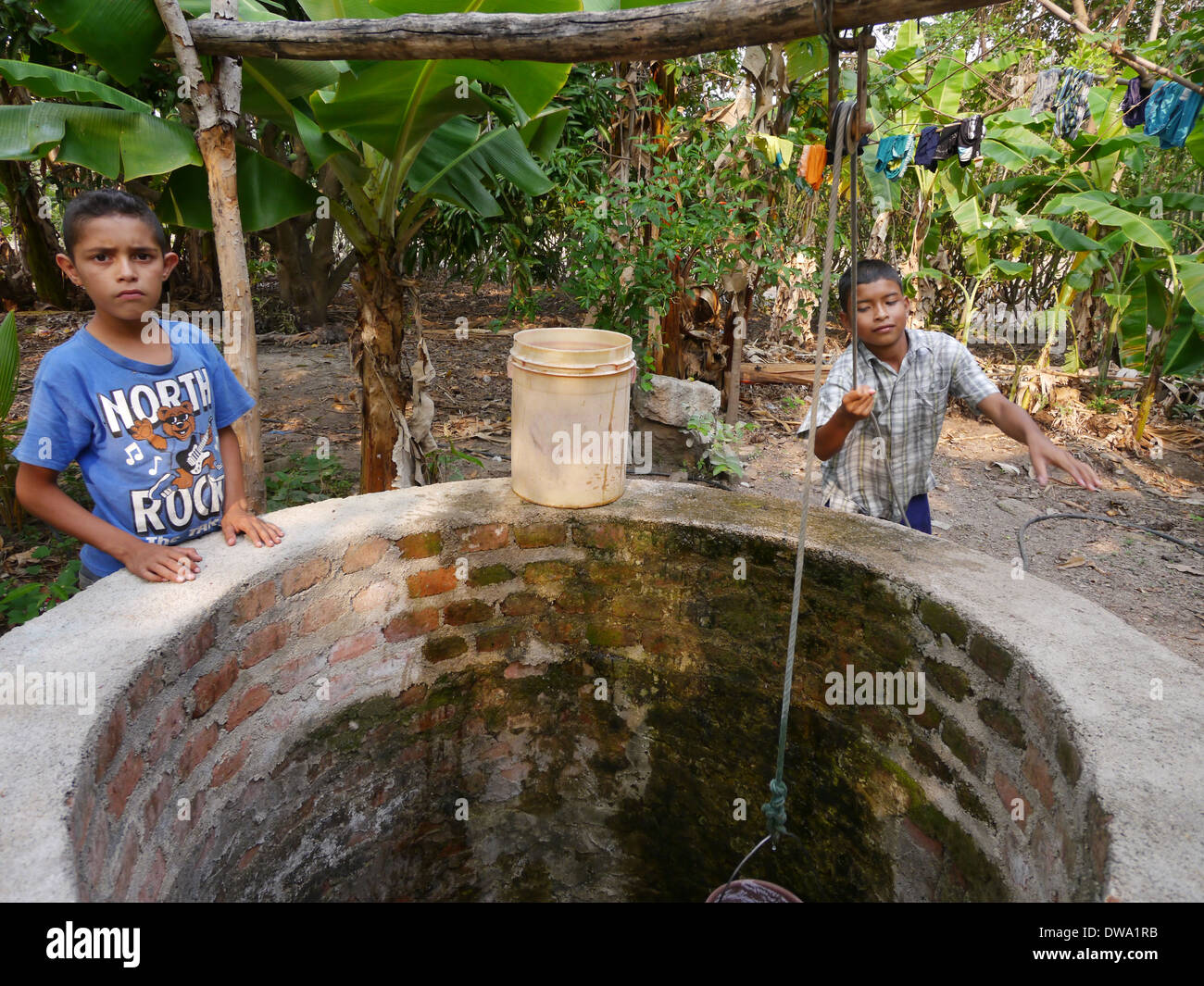 Well water boys hi-res stock photography and images - Alamy