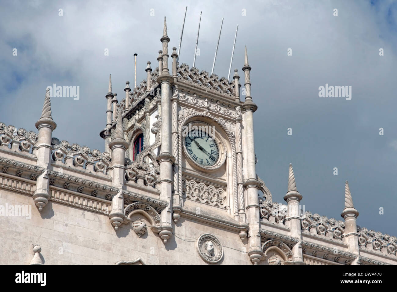 Clock in a small turret and abundant sculptural decoration- Rossio ...