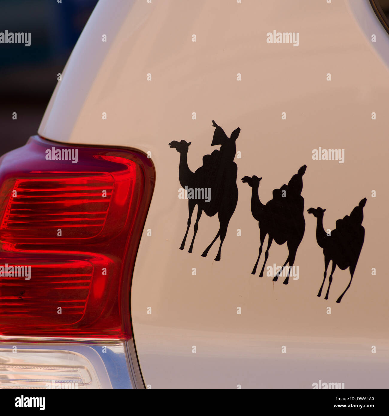 Camel-riding painting on a car, Ouarzazate, Morocco Stock Photo - Alamy