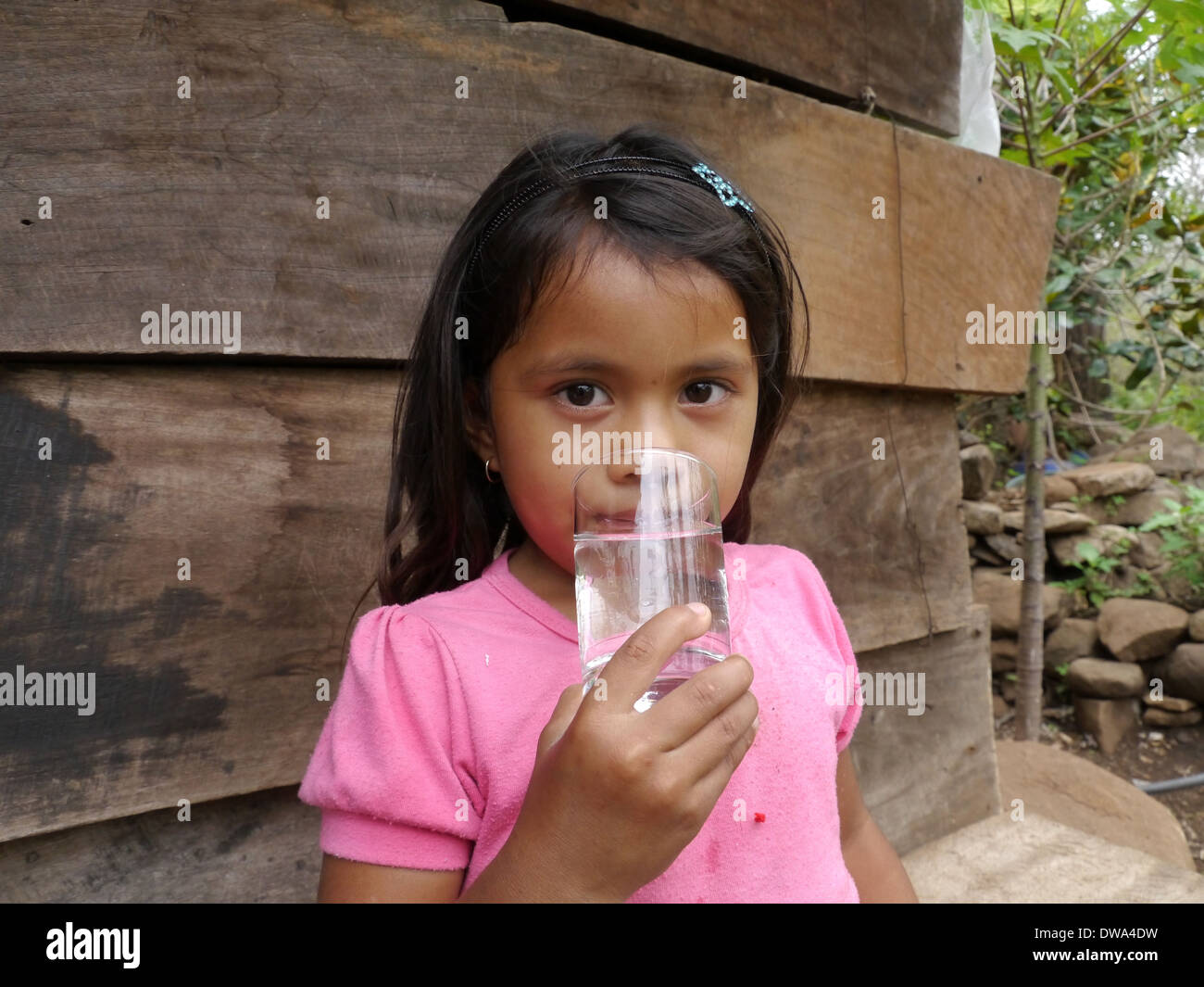 Poor child drinking water hi-res stock photography and images - Alamy
