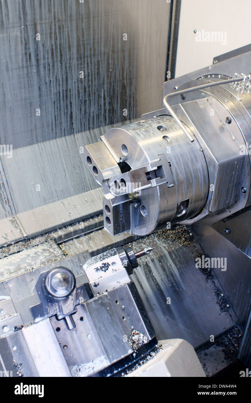 CNC Milling Machine chuck assembly used for machining metal components ...