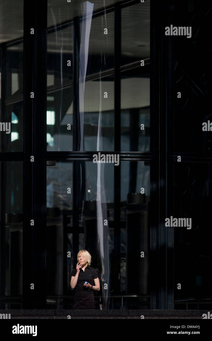 Smoking cigarette break office woman hi-res stock photography and ...
