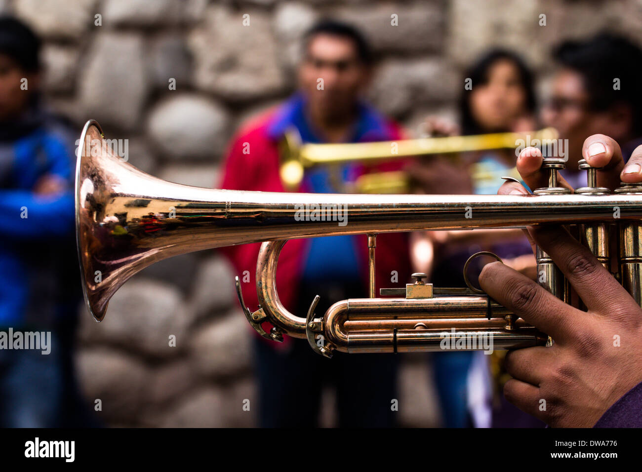 Trombones playing in a big band Stock Photo - Alamy