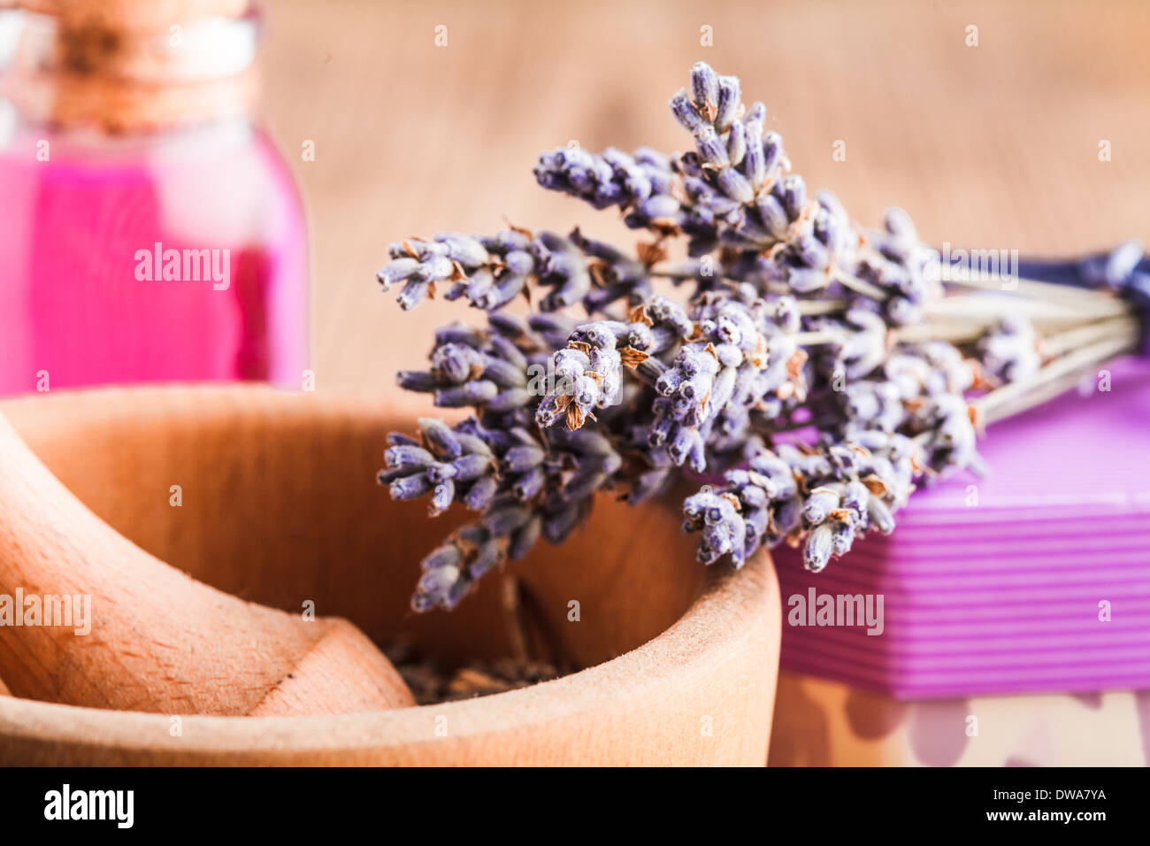 Dry lavender bunch and wooden mortar, preparation Stock Photo - Alamy