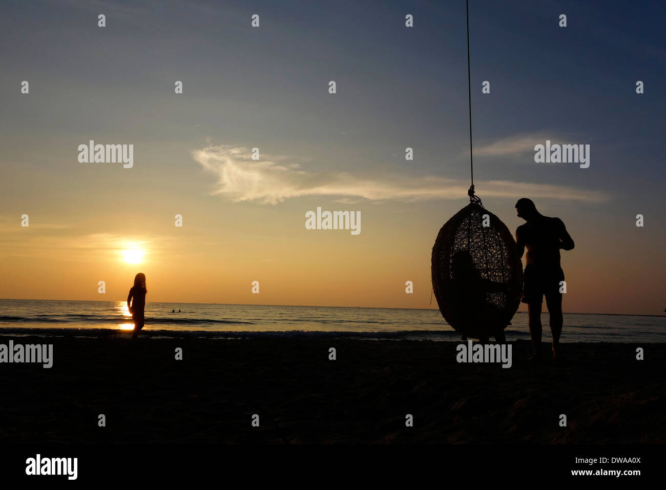 Rope swing on beach hi-res stock photography and images - Alamy