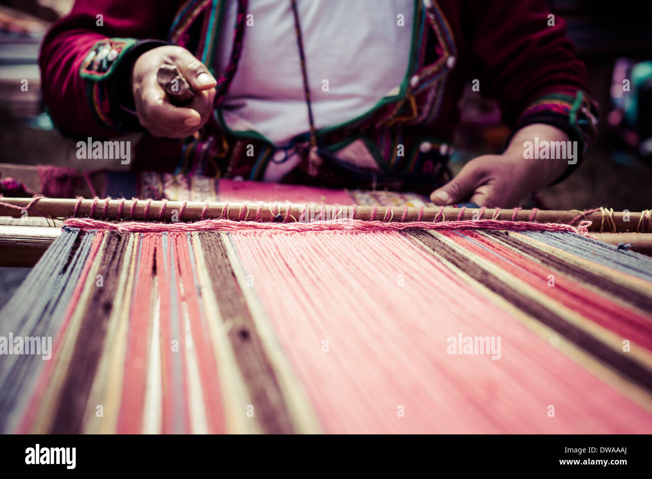 Traditional hand weaving in the Andes Mountains, Peru Stock Photo - Alamy