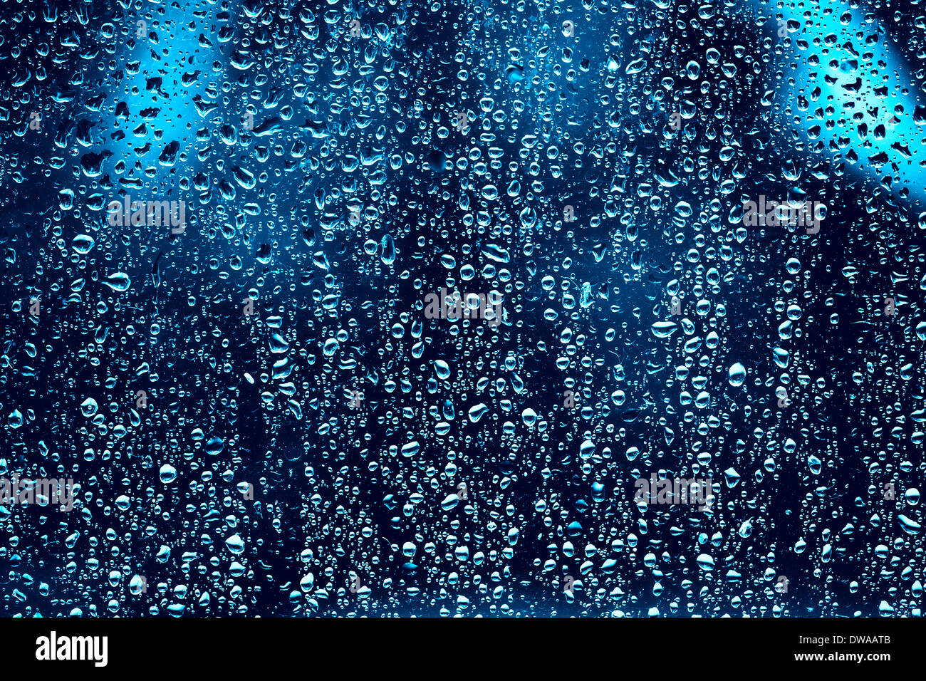 drops water blue texture on glass or raining weather background Stock ...