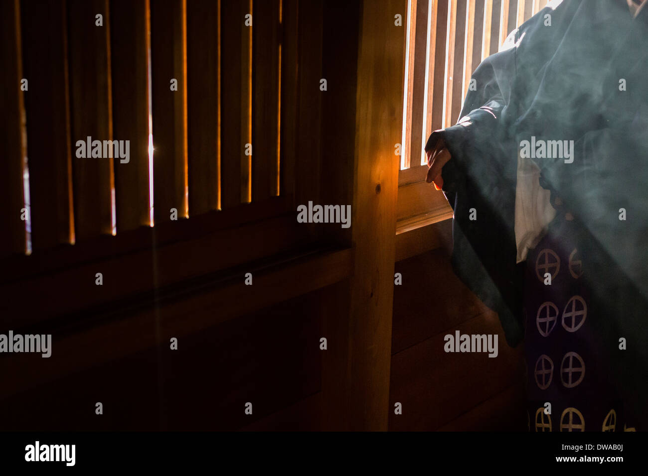 Buddhist priests attend the fire ceremony in one of the temples in ...