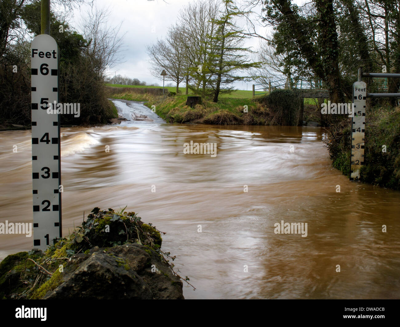 Flooded ford crossing the River Rea, Neen Savage, Shropshire, England ...