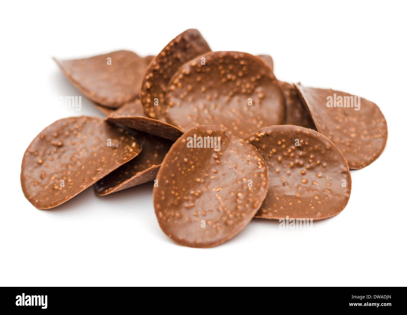 Chocolate nut chips isolated on white background Stock Photo - Alamy