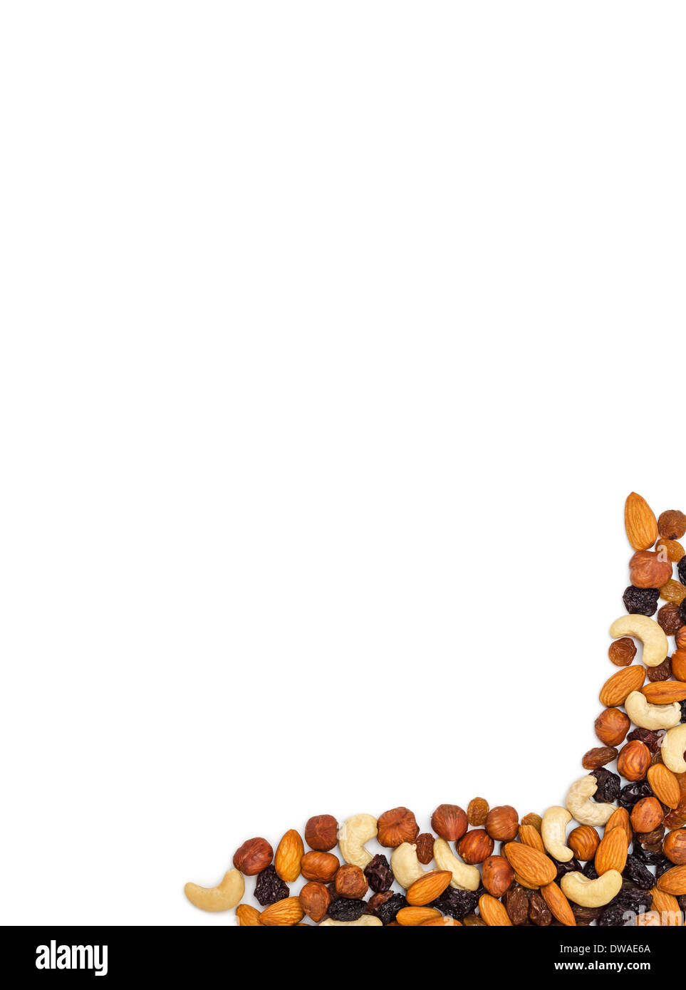 Mixed nuts and dry fruits background. Clipping path Stock Photo - Alamy