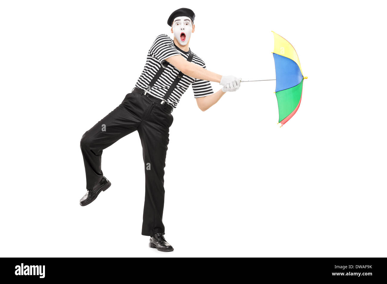 Man with wind blown umbrella hi-res stock photography and images - Alamy