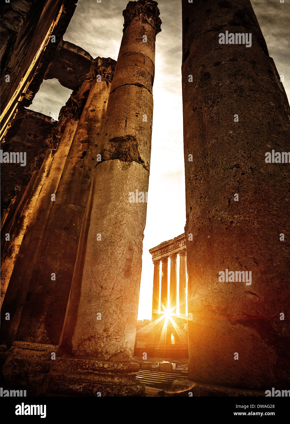 Baalbeck ruins in bright orange sunset, aged arabian architecture ...