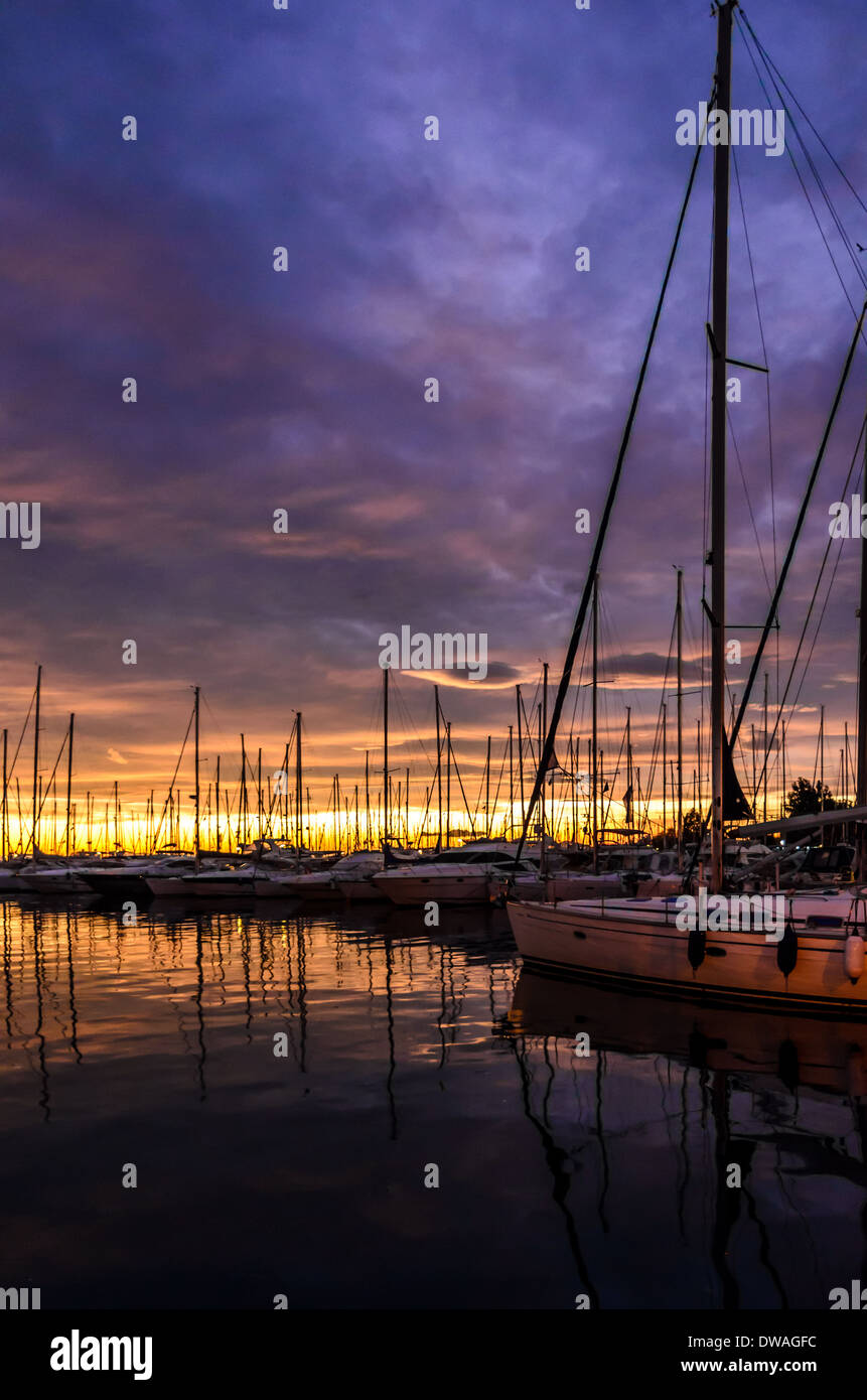 Yachts in the marina at sunset Stock Photo - Alamy