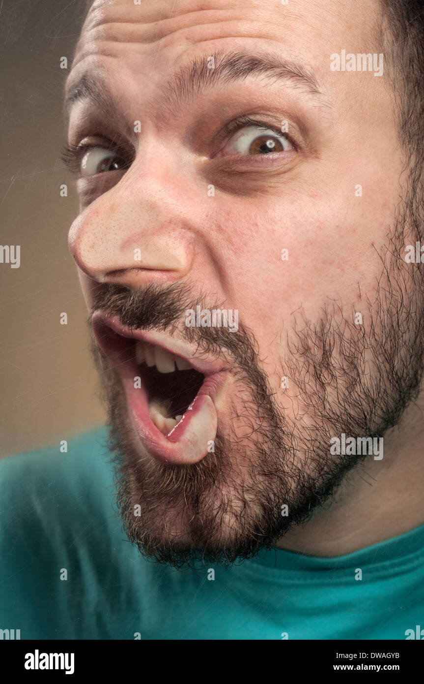 Faces - Hit The Glass Stock Photo - Alamy