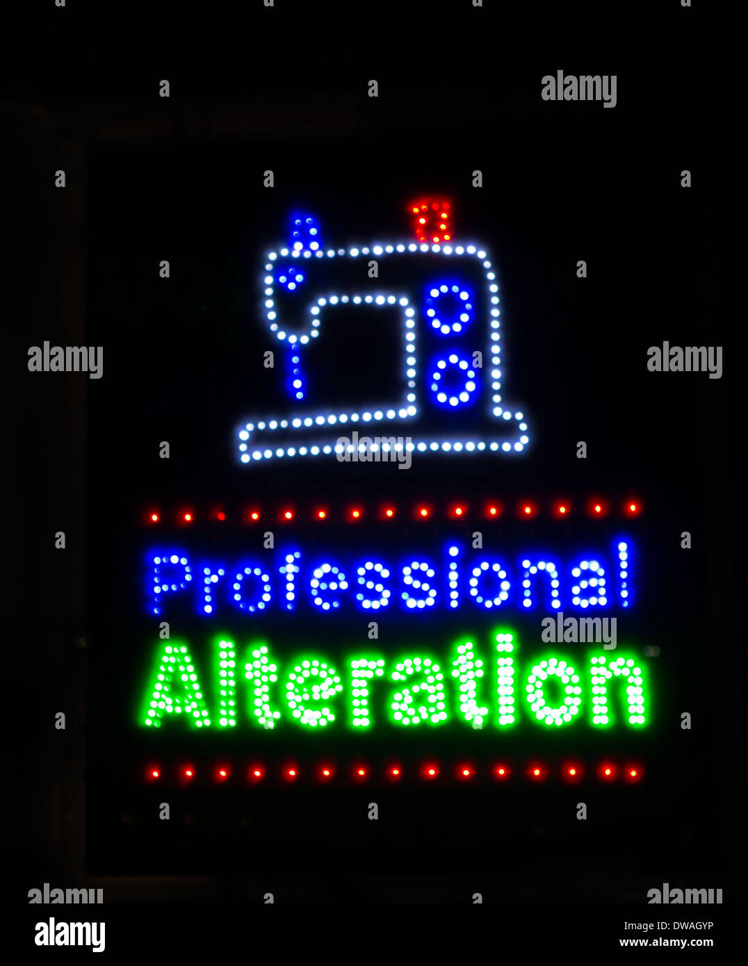 professional alteration neon sign Stock Photo - Alamy