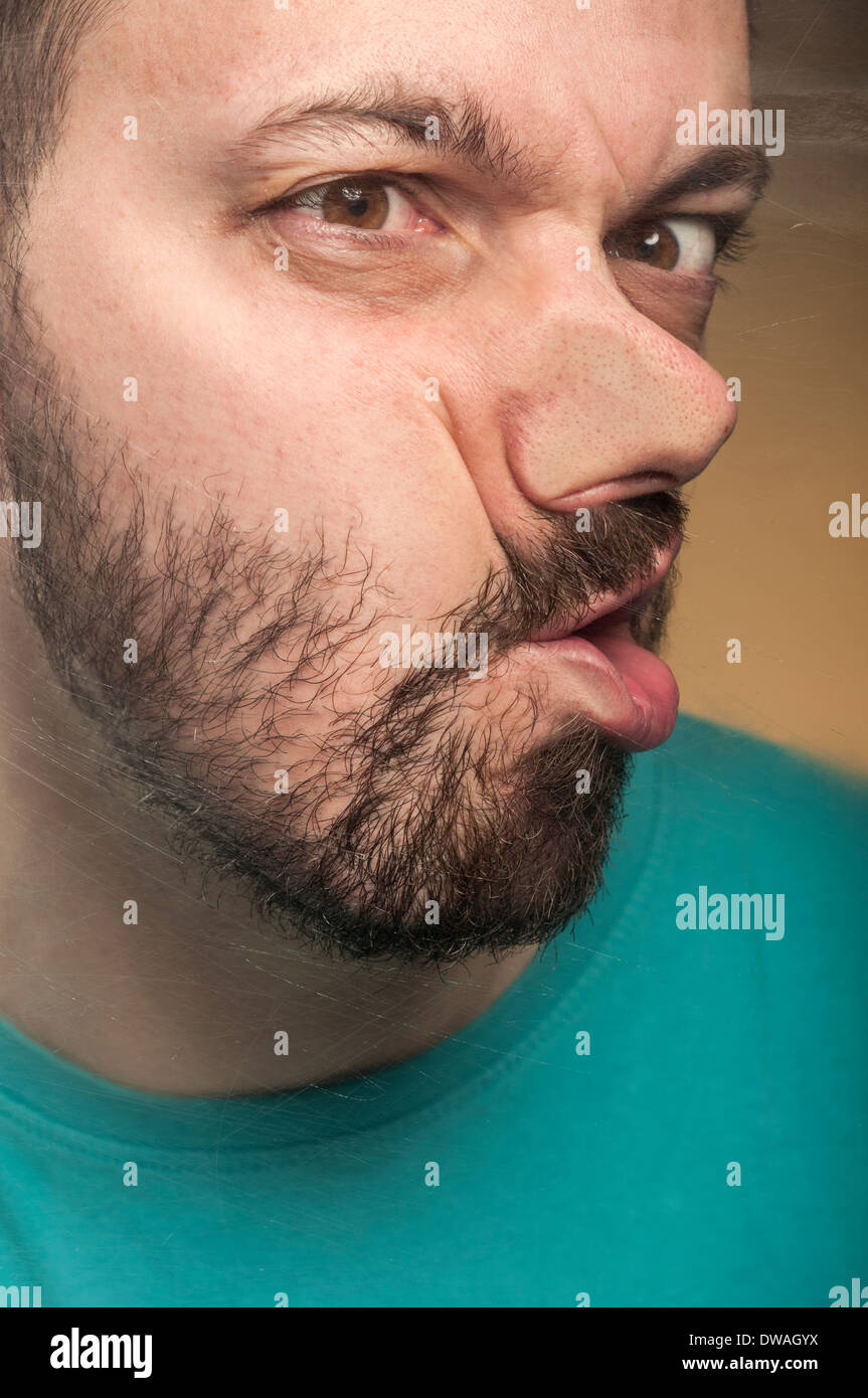 Faces - Hit The Glass Stock Photo - Alamy