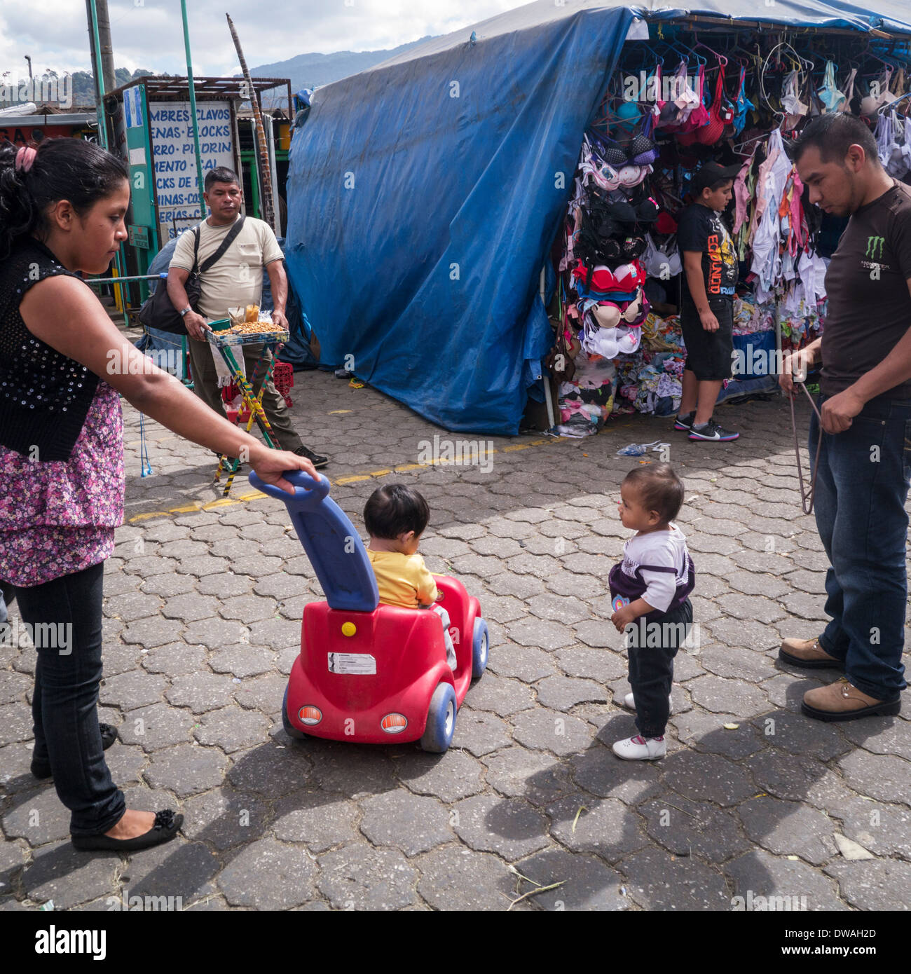Guatemalan children with modern toys hi-res stock photography and ...