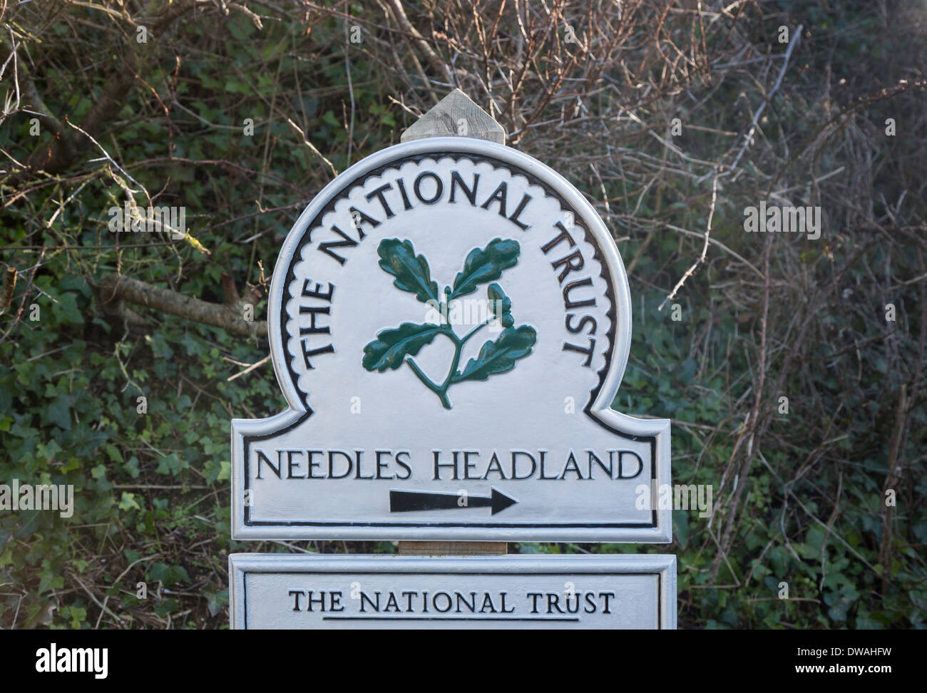 National Trust sign pointing to the Needles Headland, Isle of Wight, UK ...