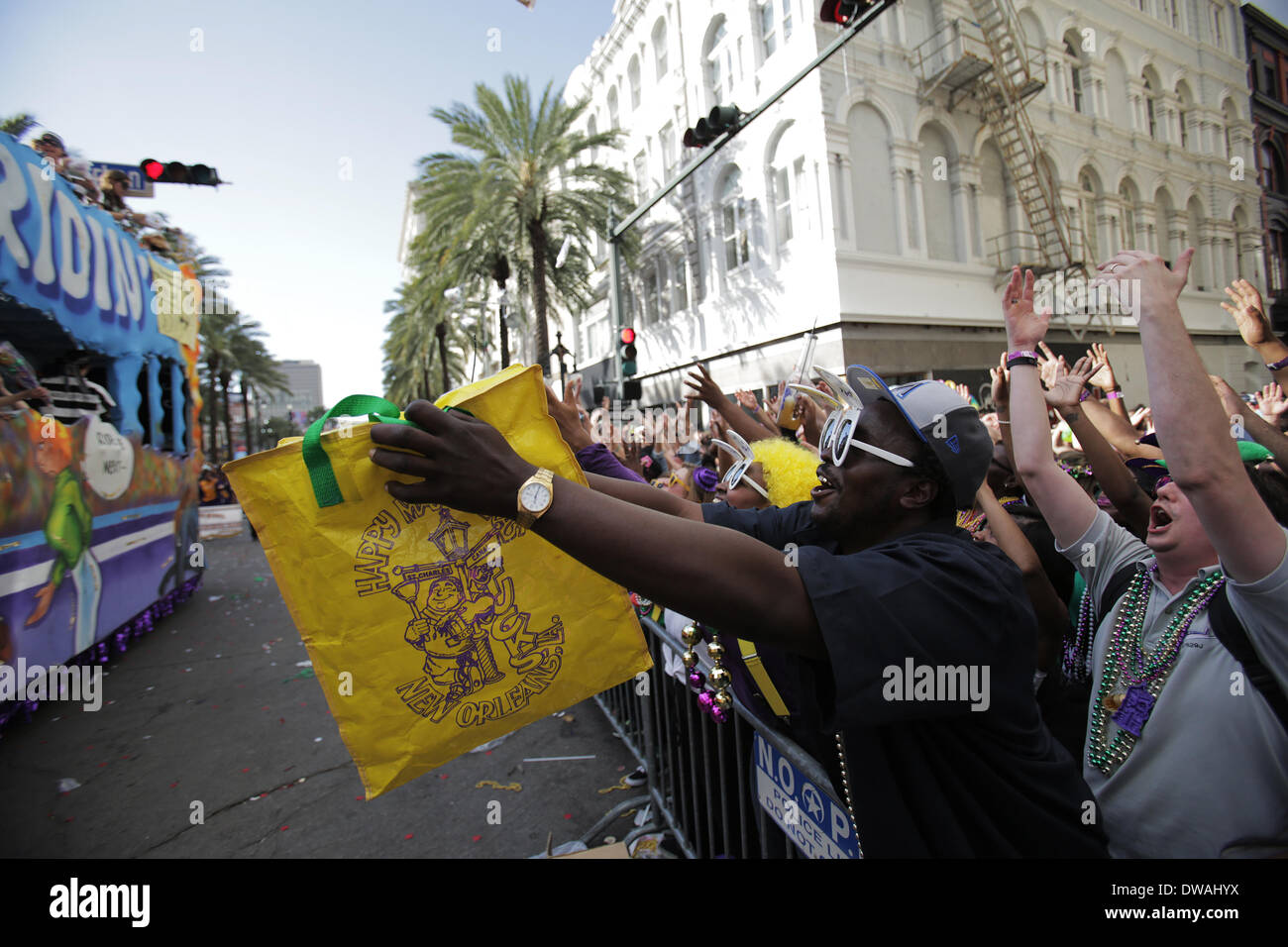 New Orleans, LOUISIANA, USA. 1st Mar, 2014. Mike Francis sticks a bag ...