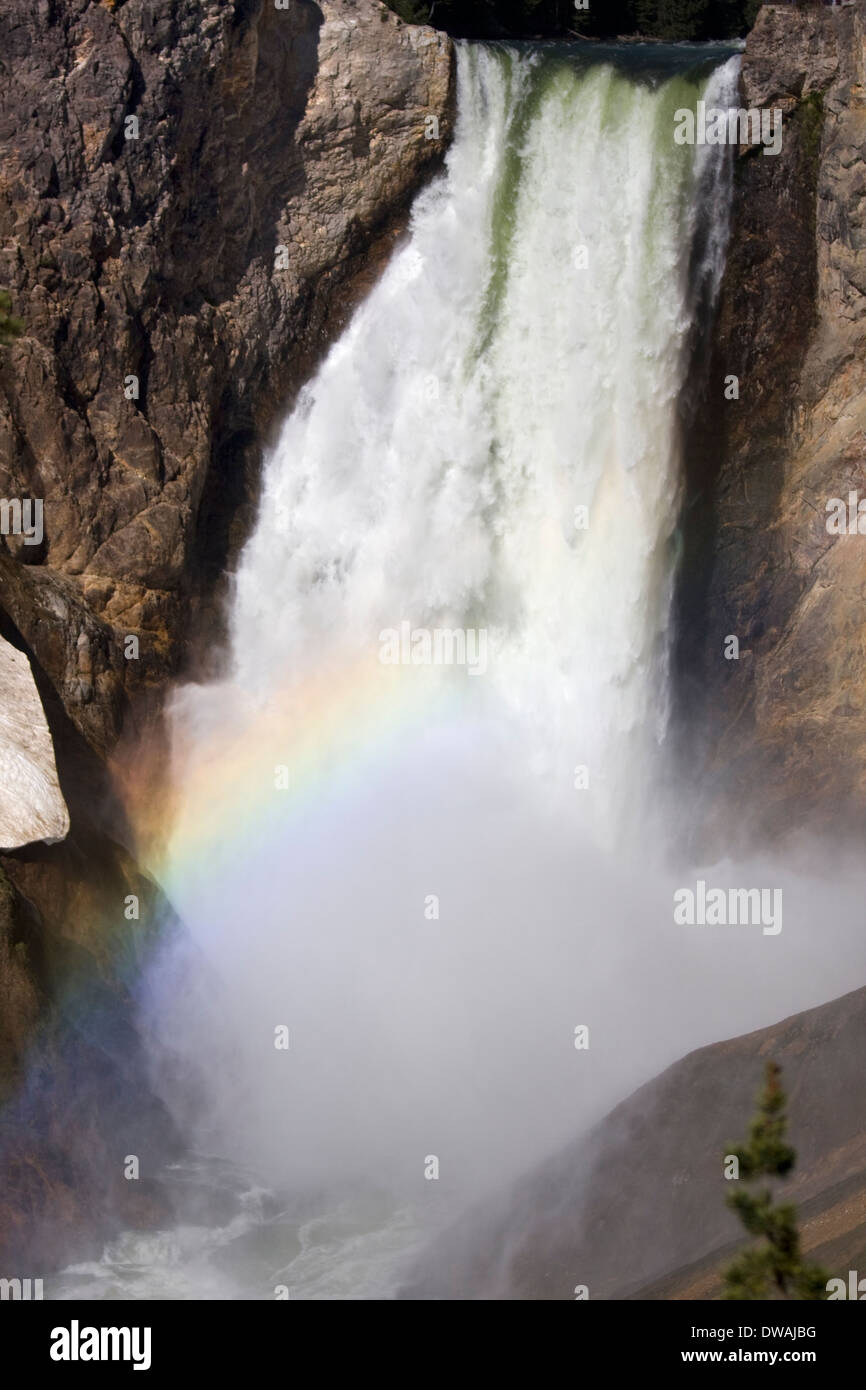 A rainbow forms at the base of Lower Falls in Grand Canyon of the ...
