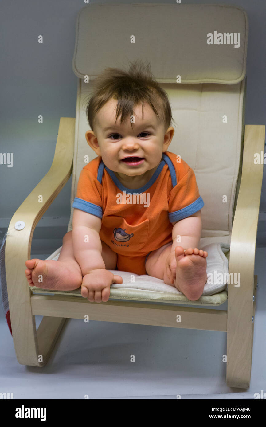 toddler boy in chair Stock Photo - Alamy