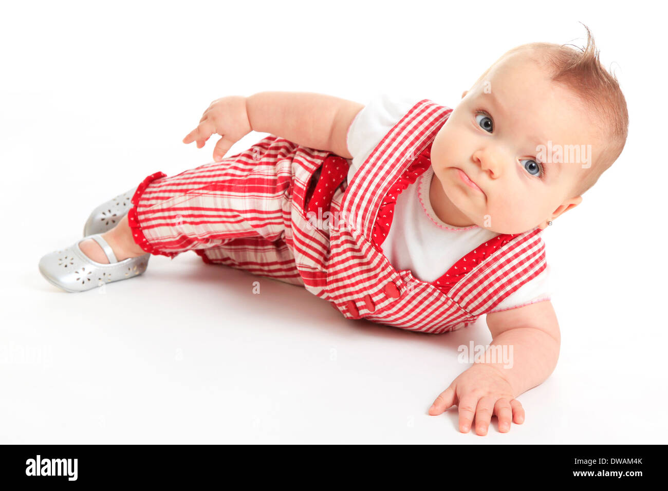 Baby girl portrait wearing an elegant red suit Stock Photo - Alamy