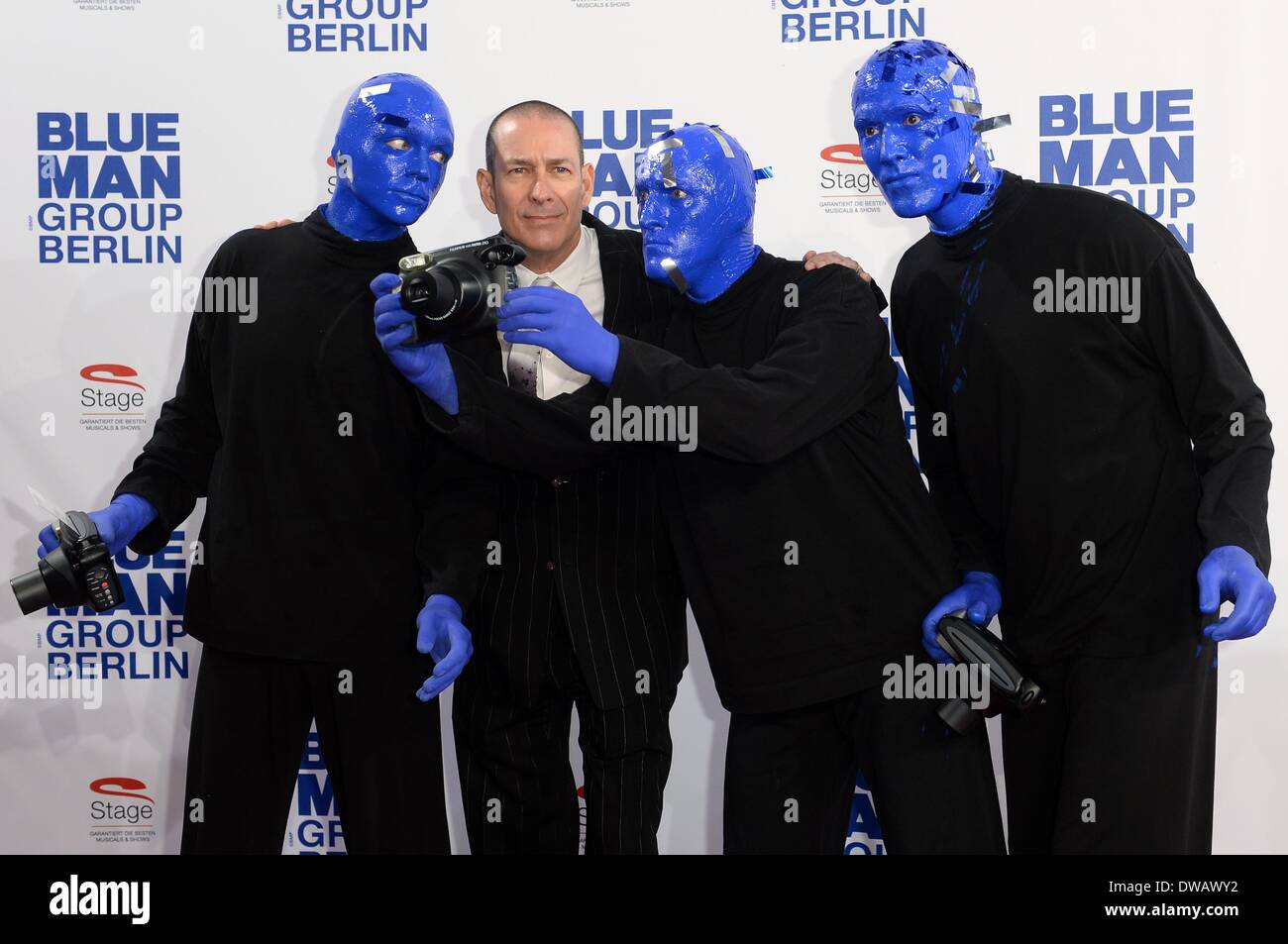 Berlin, Germany. 04th Mar, 2014. US artist Phil Stanton (2-L), co ...