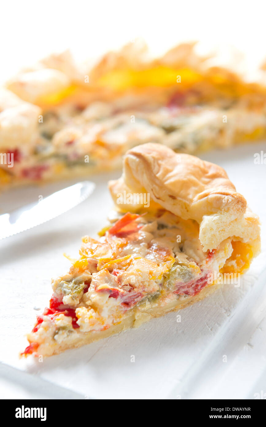 Slice of vegetarian quiche with cheese and capsicum Stock Photo - Alamy