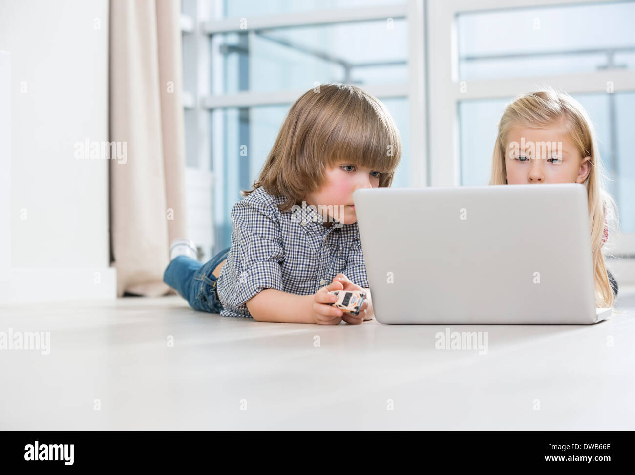 Girl on floor hi-res stock photography and images - Alamy