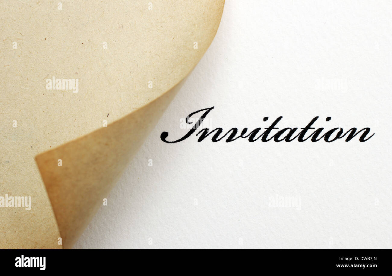 Invitation text behind paper Stock Photo - Alamy