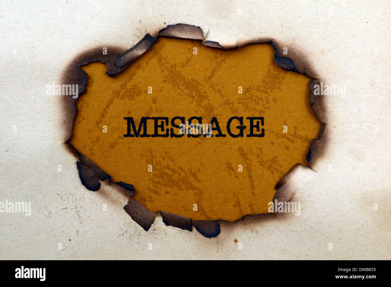 Message text on paper hole Stock Photo - Alamy