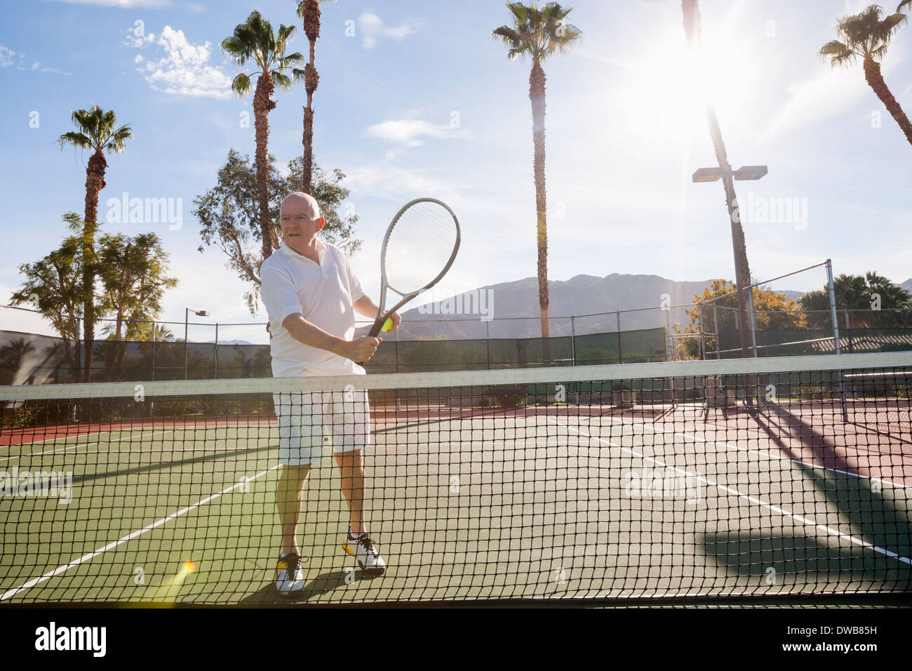 Tennis player holding tennis racket hi-res stock photography and images ...