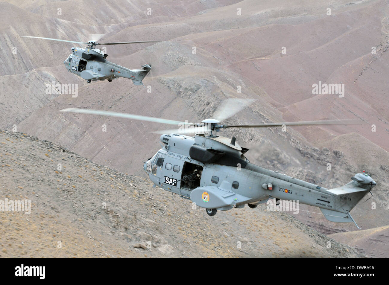 Spanish NH90 tactical transport helicopters fly a ISAF multi-ship patrol December 19, 2013 over ...