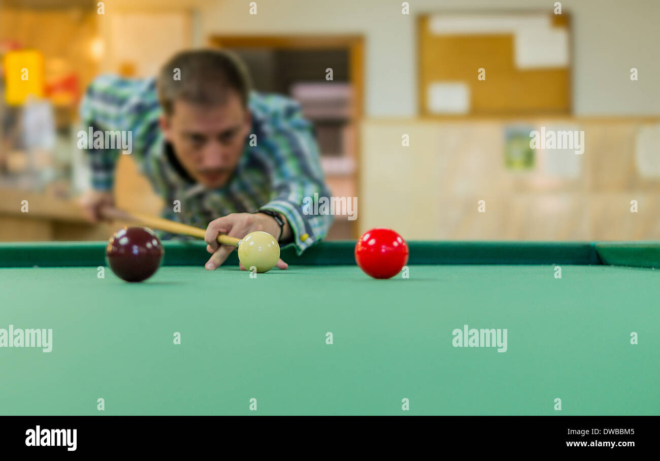 Young man playing snooker. Billiard Stock Photo - Alamy