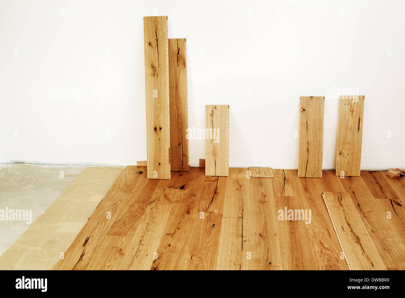 Laying finished oak parquet flooring, close-up Stock Photo - Alamy