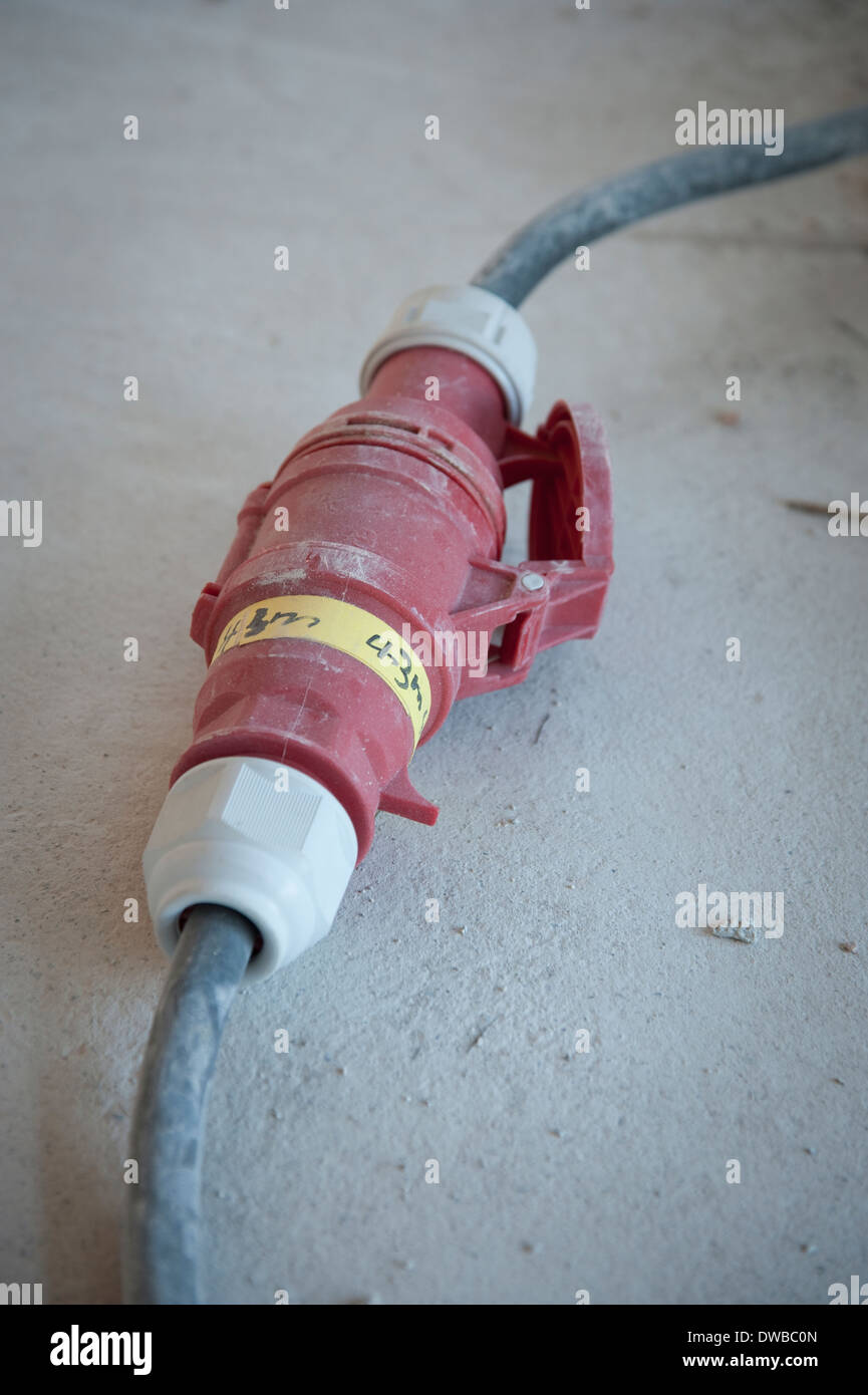 High voltage power line on a construction site Stock Photo - Alamy