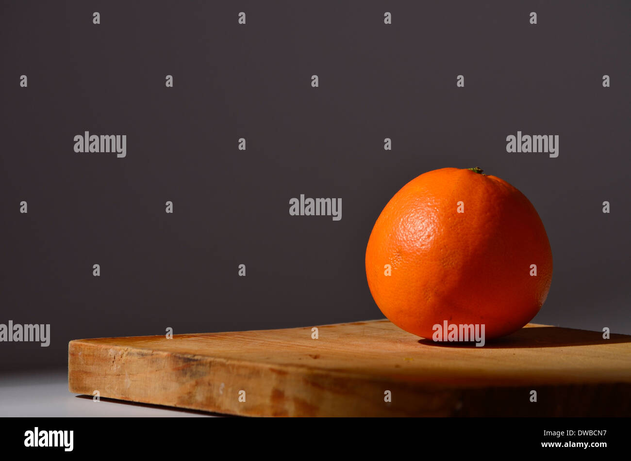 One orange fruit Stock Photo - Alamy