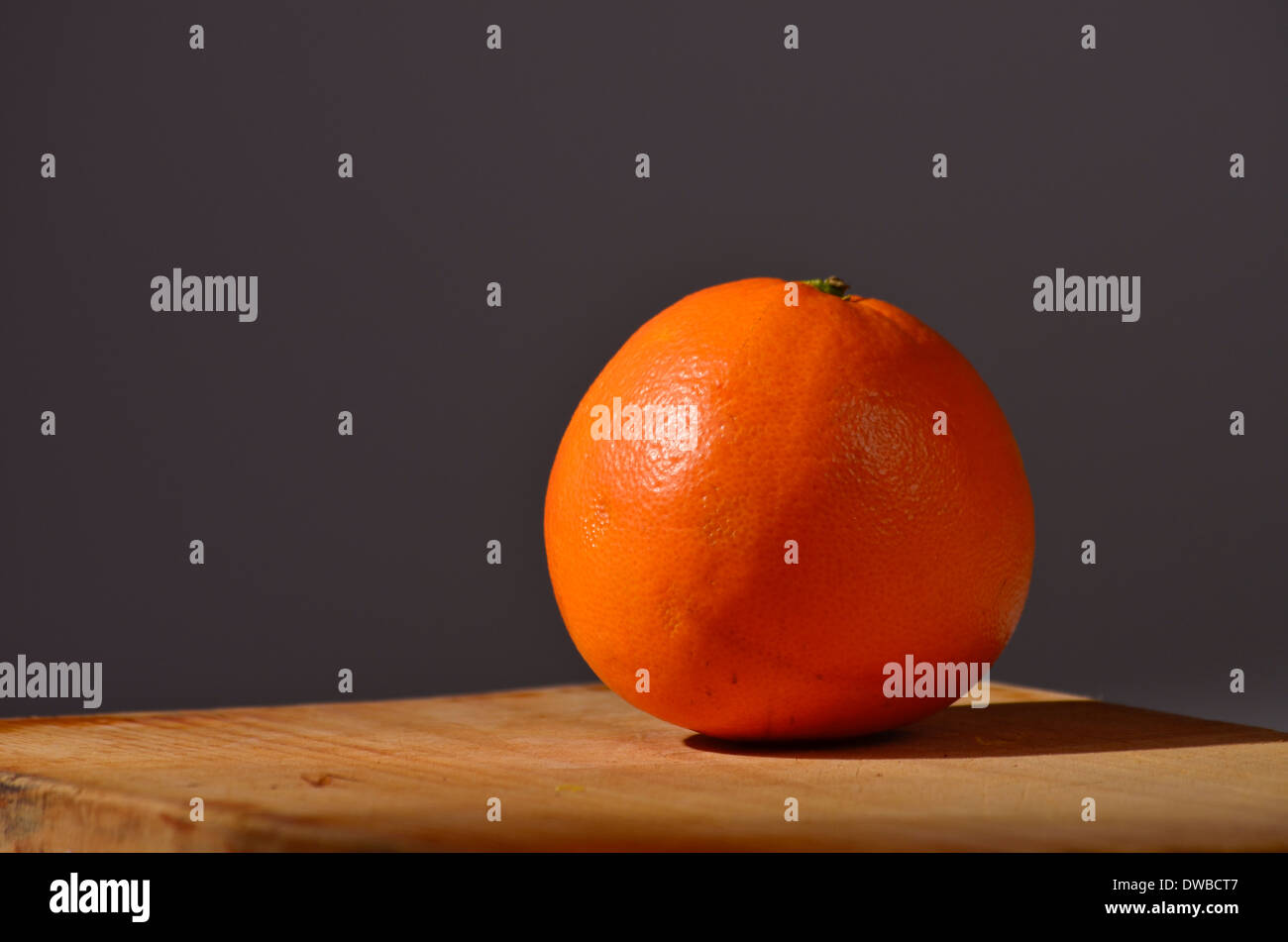 One orange fruit Stock Photo - Alamy