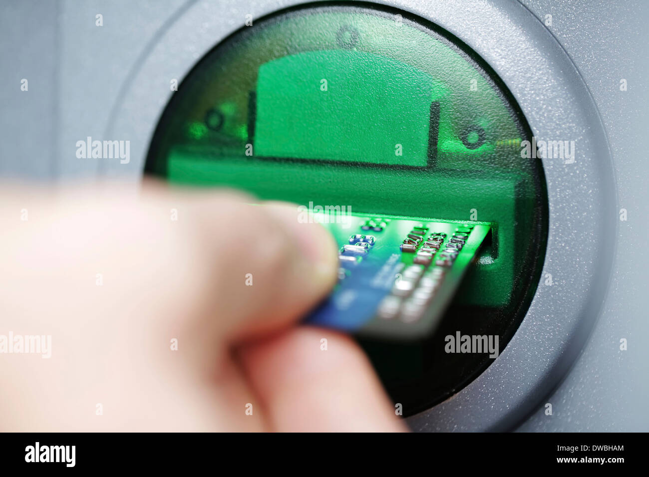 Man pushing credit card at cash dispenser, close-up Stock Photo - Alamy