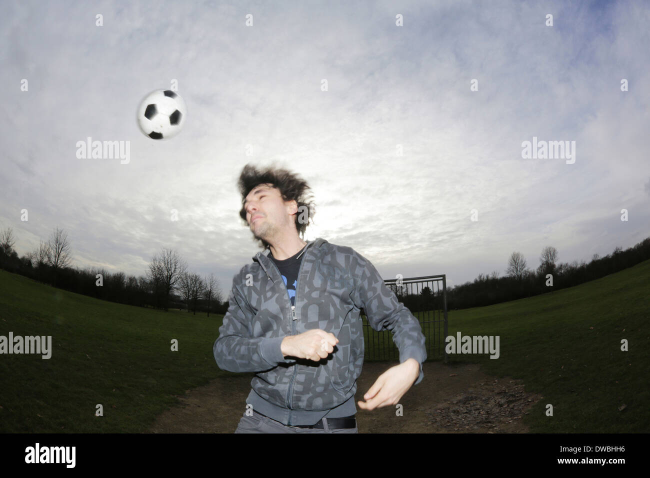 Football head header mid air jumping hi-res stock photography and ...